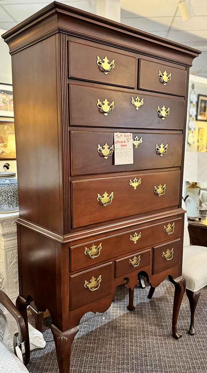 This stunning cabinet with brass hardware proves they really don't make 'em like they used to, folks.