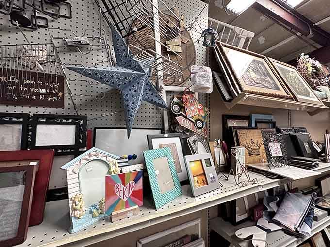 Metal stars and picture frames create an eclectic wall art collection that interior designers would call "curated charm."