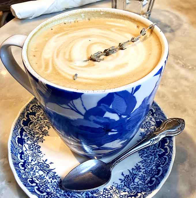 That latte art looks like it's waving hello, which is appropriate since you'll be saying hello to happiness.