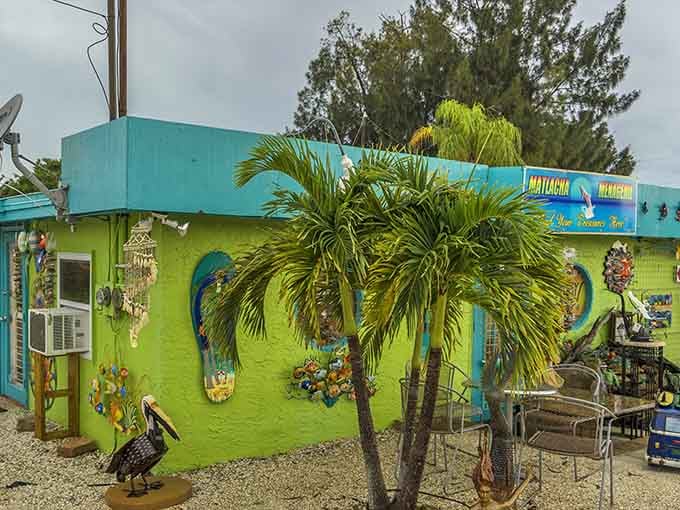 Lime green buildings flanked by palm trees create a tropical fever dream you'll actually want to experience firsthand.