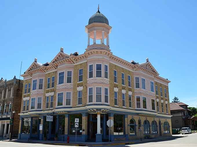 The Audubon Inn's distinctive turret and Victorian details make it impossible to miss, like a wedding cake designed by optimistic architects.