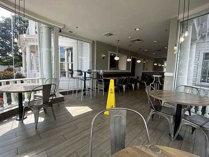 The porch seating offers fresh air and architectural charm, because apparently your Happy Meal deserves ambiance now too.