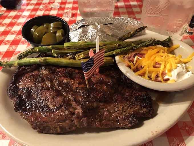 That perfectly charred ribeye with grilled asparagus looks like it belongs in a steakhouse charging triple the price, honestly.