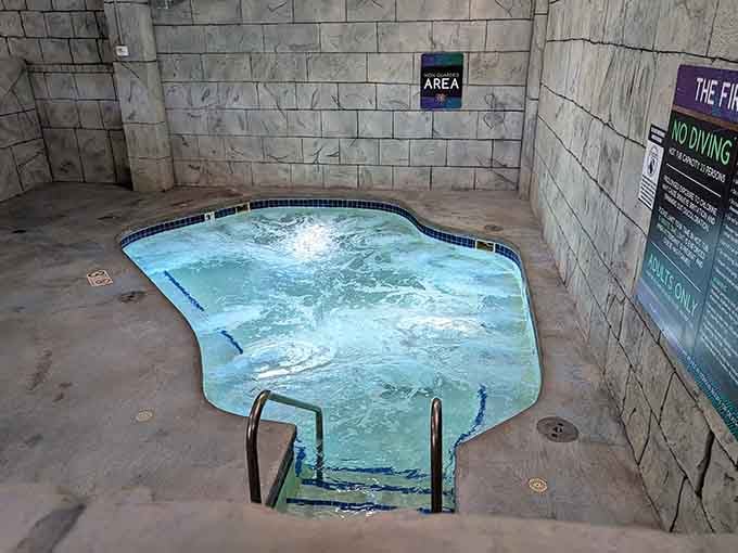 This hot tub beckons like a warm hug after conquering those towering slides you just saw.