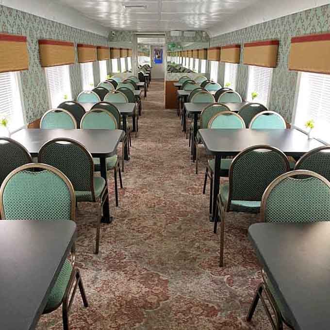Before the crowds arrive, the dining car waits in peaceful anticipation of the theatrical chaos about to unfold.
