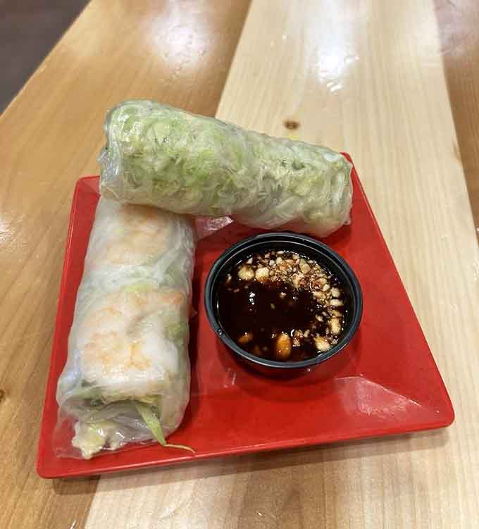 Fresh shrimp spring rolls wrapped tight in translucent rice paper, like little flavor presents you unwrap yourself.