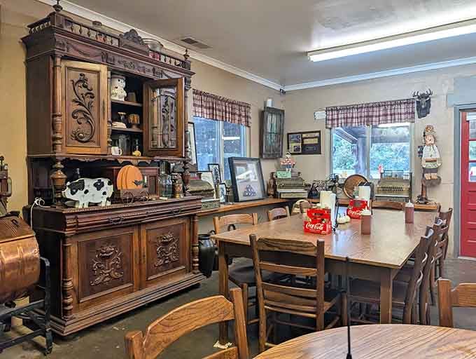Antique furniture and cow figurines create a dining room that feels like your favorite uncle's place, welcoming and genuine.