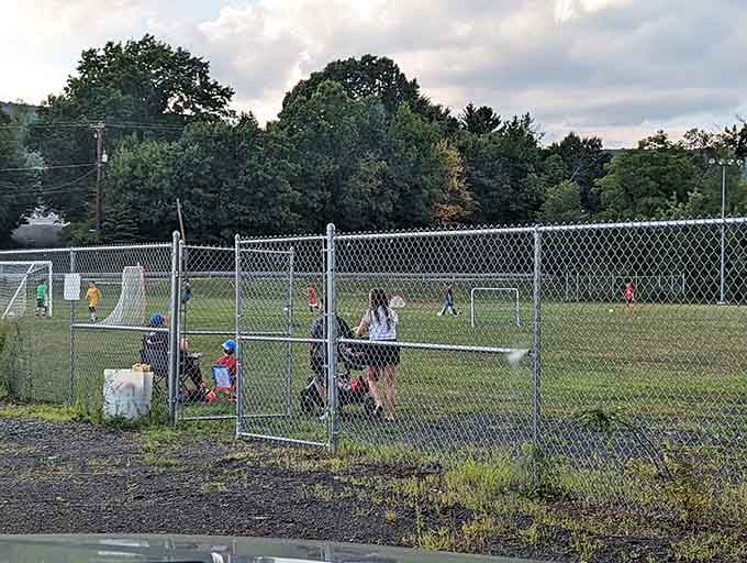 Local kids playing soccer, completely unaware they're growing up in the Pizza Capital of the World.