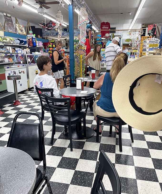 That checkered floor and vintage seating create the perfect backdrop for multigenerational memories over ice cream and conversation.