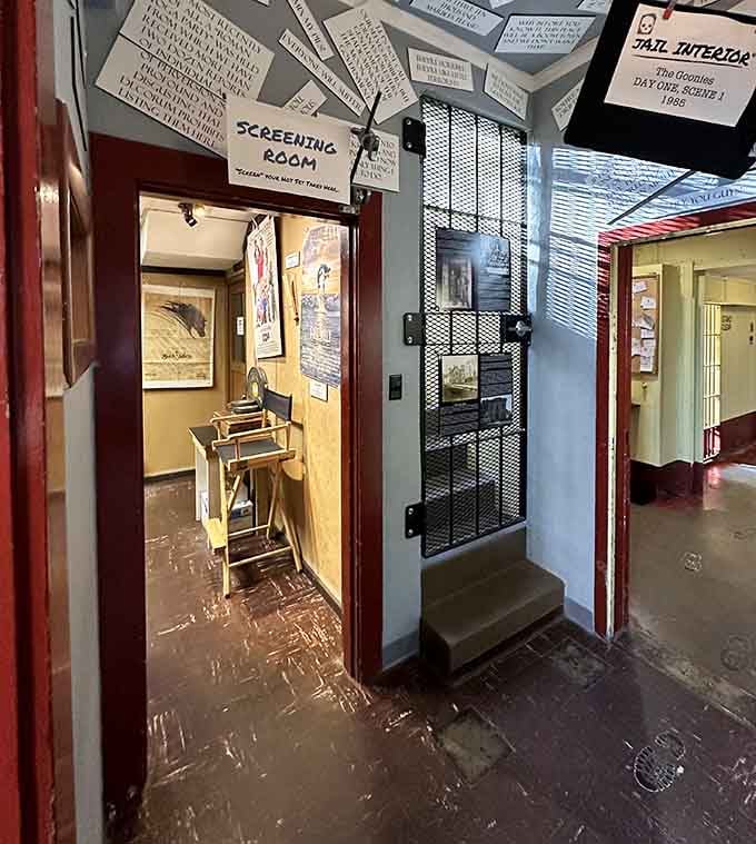 The screening room entrance beckons, where films come alive in a space that's seen plenty of its own drama.