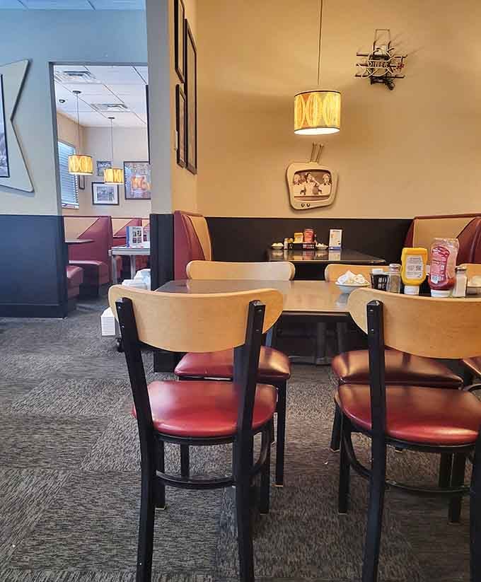 Classic diner seating where strangers become neighbors and everyone agrees the coffee should keep flowing without interruption.
