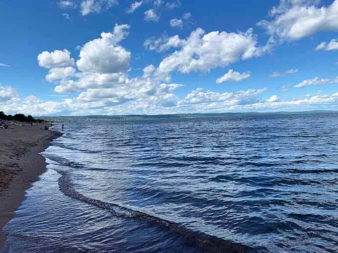 Perfect beach days feature clouds that look like they were painted by an overly ambitious artist.