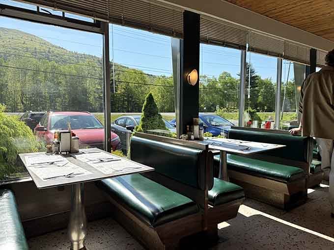 Those window booths with mountain views turn every meal into dinner theater, nature's backdrop included at no extra charge.