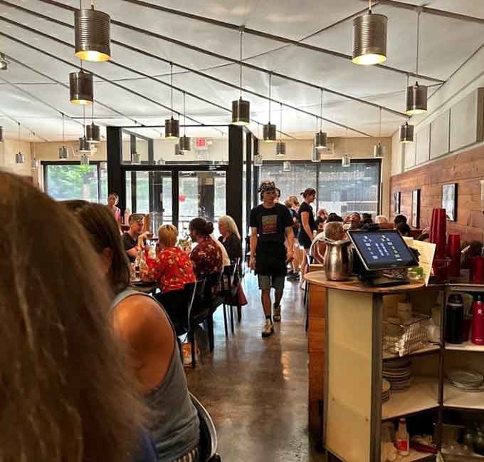 The dining room hums with happy conversation, proof that great pizza brings people together beautifully.