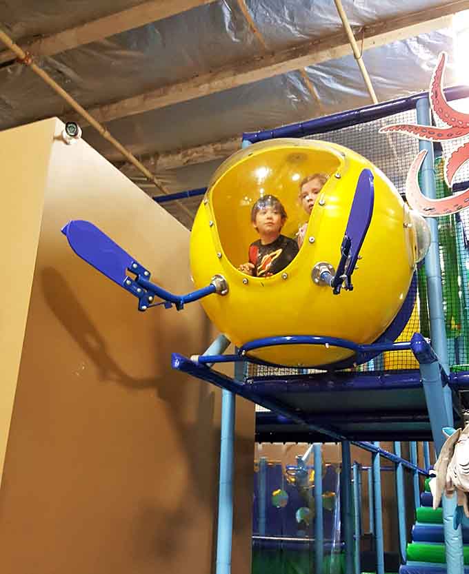 Inside this yellow submarine pod, your little ones become captains of their own underwater vessel, portholes and all.