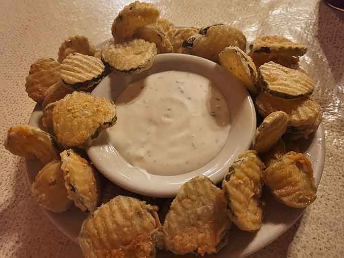 Fried pickles with ranch dressing: because sometimes the best appetizers are the simplest ones done right.