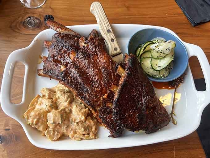 BBQ ribs with all the fixings, the kind of plate that makes you glad you wore stretchy pants.