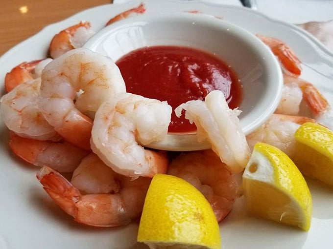 Shrimp cocktail done right: plump, perfectly cooked, and begging to be dunked in that tangy cocktail sauce.