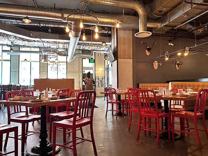 Red chairs and communal tables create the perfect setting for groups who actually enjoy each other's company.