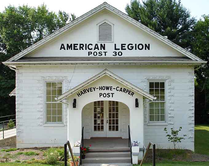 White clapboard and arched doorway welcome veterans to gather, share coffee, and swap tales from the good old days.