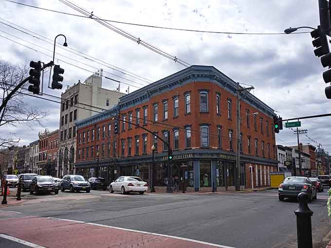 Corner buildings with arched windows stand proud, reminding us that good bones never go out of style.