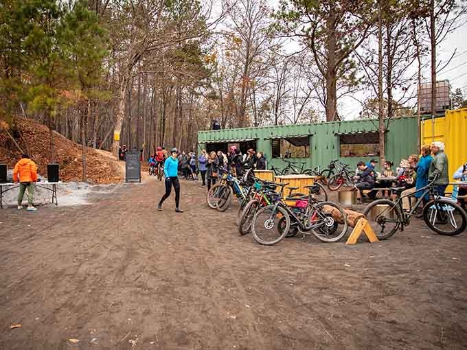 The vibrant community gathers at base camp, where colorful bikes and even more colorful personalities create infectious energy.