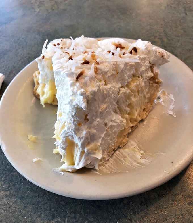 That towering coconut cream pie slice could make a grown person weep with joy and anticipation in equal measure.