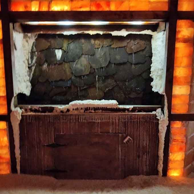 A backlit salt waterfall feature adds visual serenity to an already impossibly peaceful space you'll never want to leave.