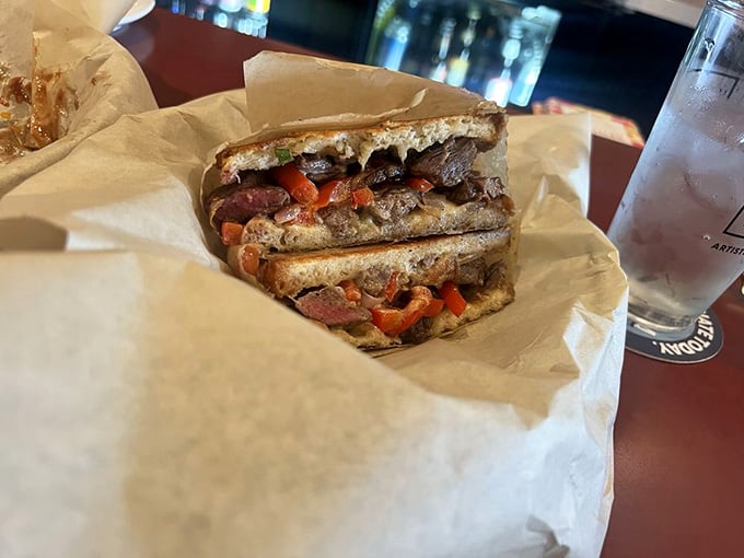 The Ponzu Melt stacks tender beef with peppers between bread, creating handheld happiness worth the drive.