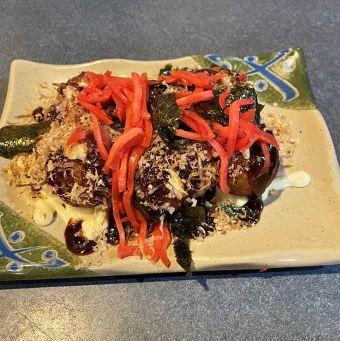 Golden, crispy takoyaki that'll make you wonder why octopus balls aren't served at every family gathering ever.