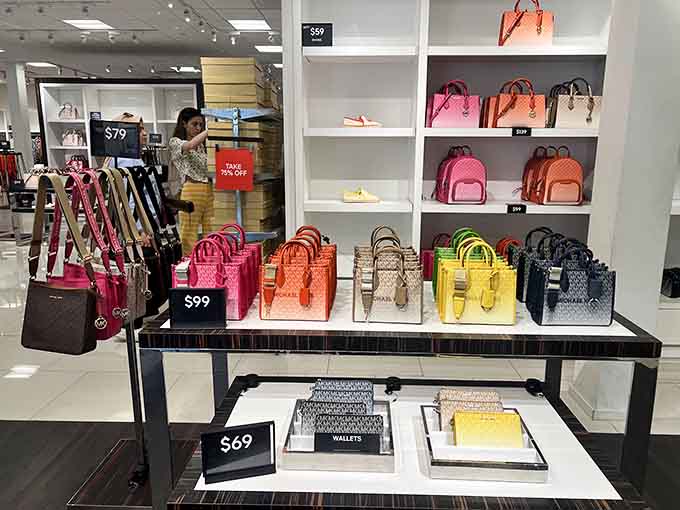 Designer handbags displayed like museum pieces, except these masterpieces won't require you to take out a loan.