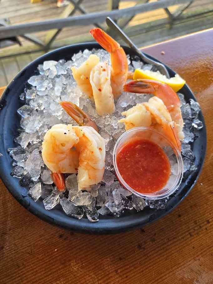 Shrimp cocktail served on ice because some classics don't need reinventing, just perfect execution and ocean views.