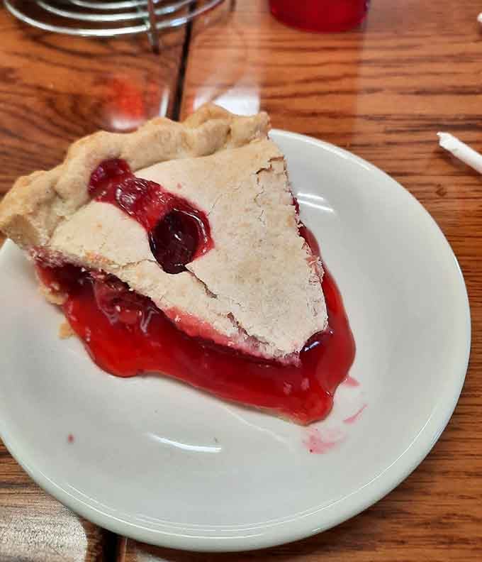Homemade cherry pie with that flaky crust and ruby-red filling is worth loosening your belt another notch.