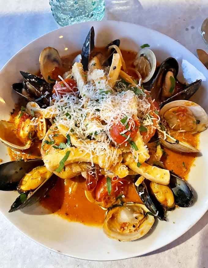 Seafood pasta loaded with mussels, clams, and shrimp that brings the ocean to your plate magnificently.