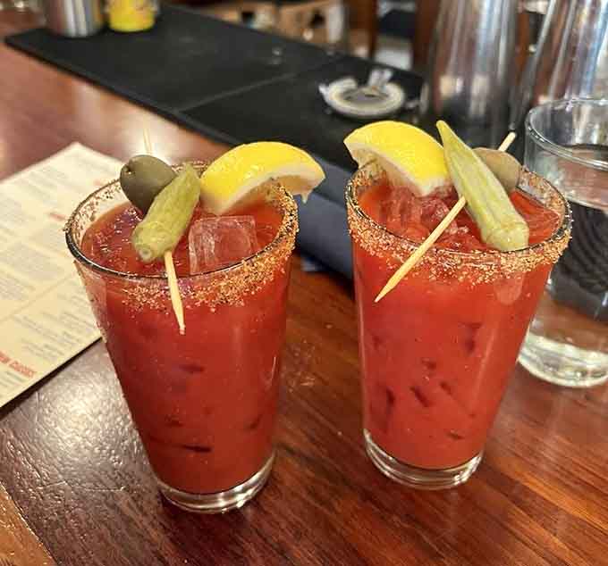 Those Bloody Marys garnished with pickled okra and lemon mean serious business about starting your day right.