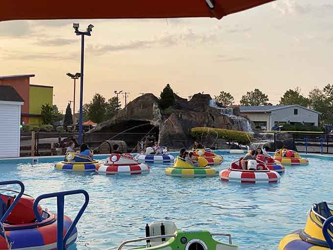 Bumper boats turn a simple pool into a battleground where everyone gets delightfully soaked and happy.
