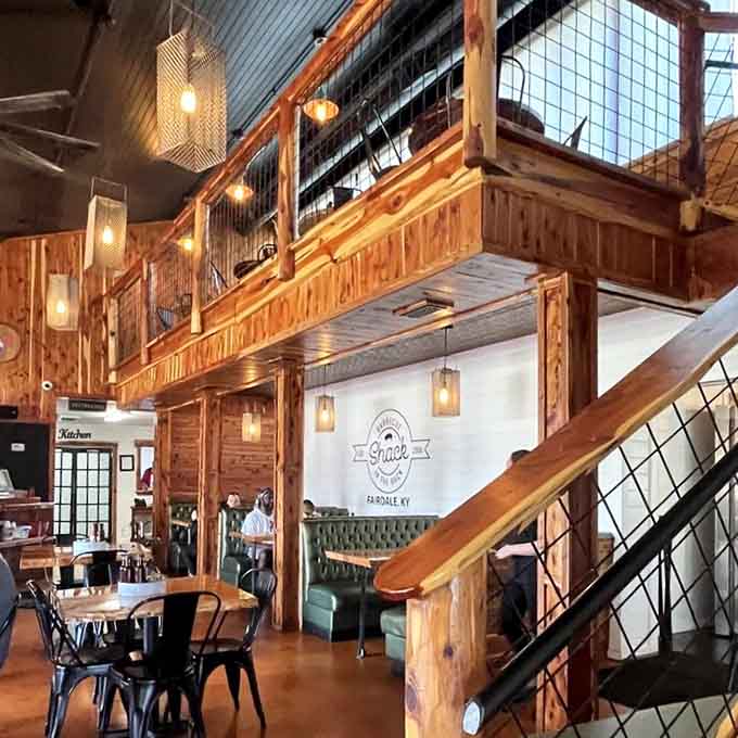 High ceilings, pendant lights, and a loft area prove this shack has serious architectural ambitions.