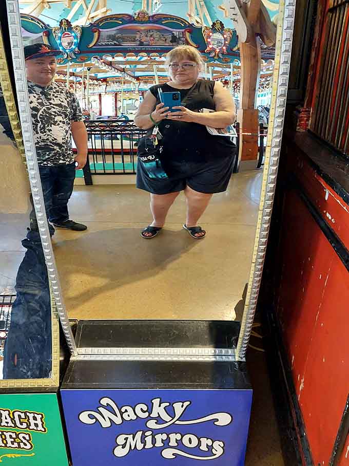Nothing says "classic amusement park" quite like a wacky mirror that makes everyone look equally ridiculous and wonderful.