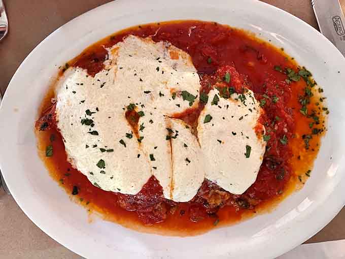 Classic parm swimming in sauce and melted cheese, because some traditions exist for very good reasons and this is one.