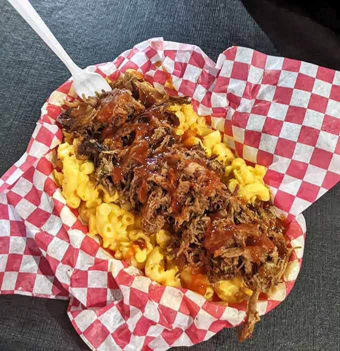 Pulled pork over mac and cheese is the kind of genius thinking that changes lives forever.
