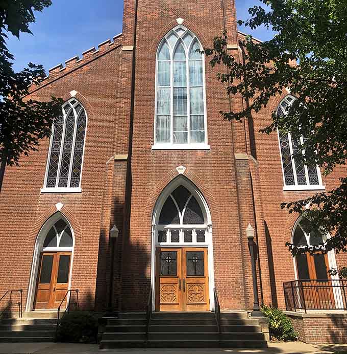 Holy Trinity Catholic Church's Gothic windows frame light in ways that modern architecture forgot how to do.