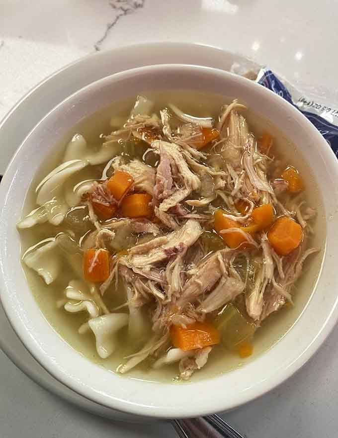Chicken noodle soup loaded with tender meat and vegetables, the kind that actually makes you feel better.