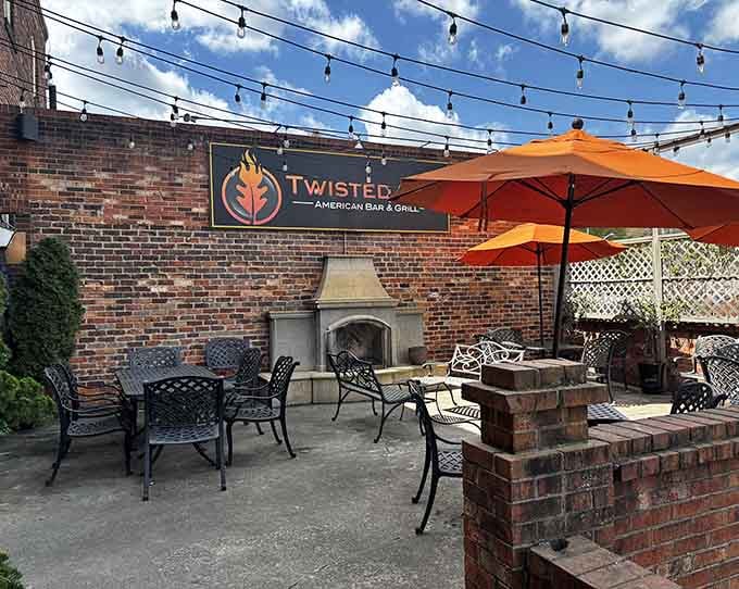 String lights and a brick fireplace create the kind of patio atmosphere that makes you want to linger over dinner indefinitely.