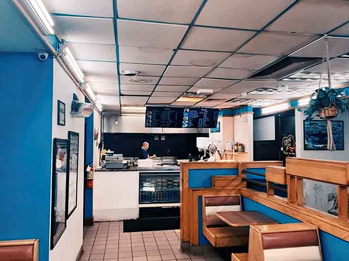 Booth seating with a view of the action, where you can watch your meal come together in real time.