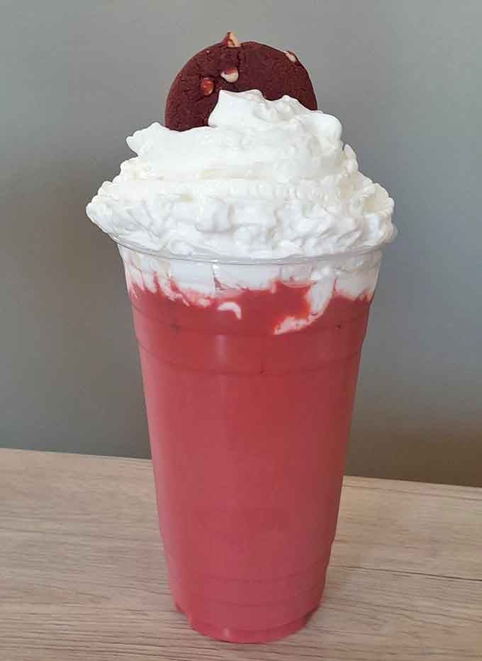 Red velvet iced coffee with a cookie garnish proves Sweet Barn doesn't do anything halfway.