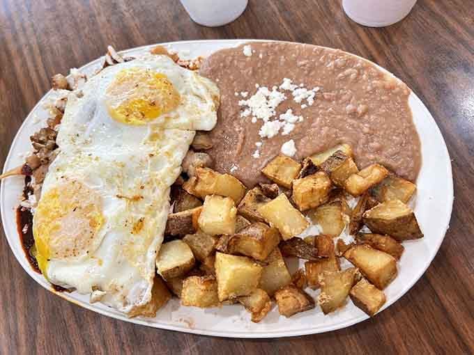 Chilaquiles topped with eggs and potatoes that make waking up early on weekends suddenly seem reasonable again.