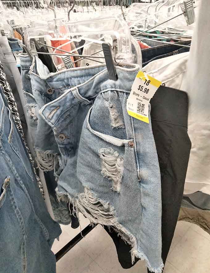 Distressed denim shorts hang ready for summer adventures, proving vintage style never goes out of fashion.
