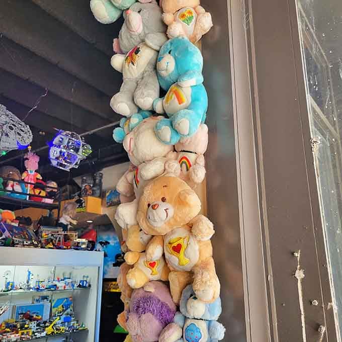 Care Bears stacked like a fluffy tower of feelings, ready to share sunshine and rainbows with anyone who'll listen.