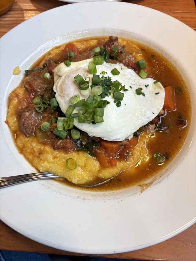 Pork ragu over grits with a poached egg, the kind of Southern-meets-Northwest fusion that just works beautifully.