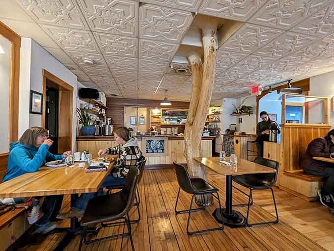 The pressed tin ceiling and warm wood create the kind of atmosphere where good meals become great memories.